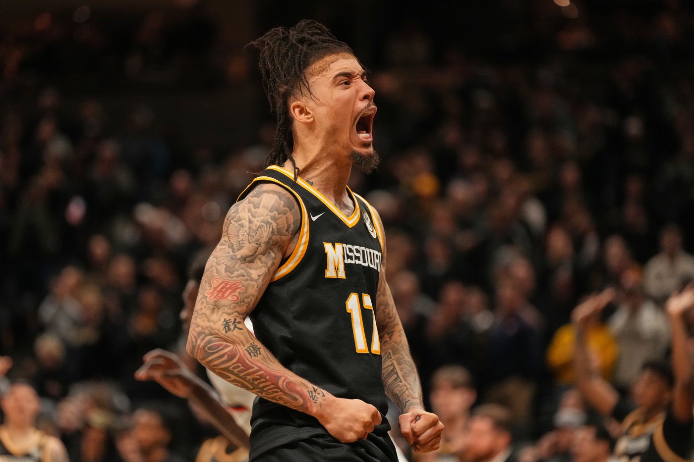 Stone scores 22, Mitchell 20 as Missouri beats Auburn 84-74, improves ...