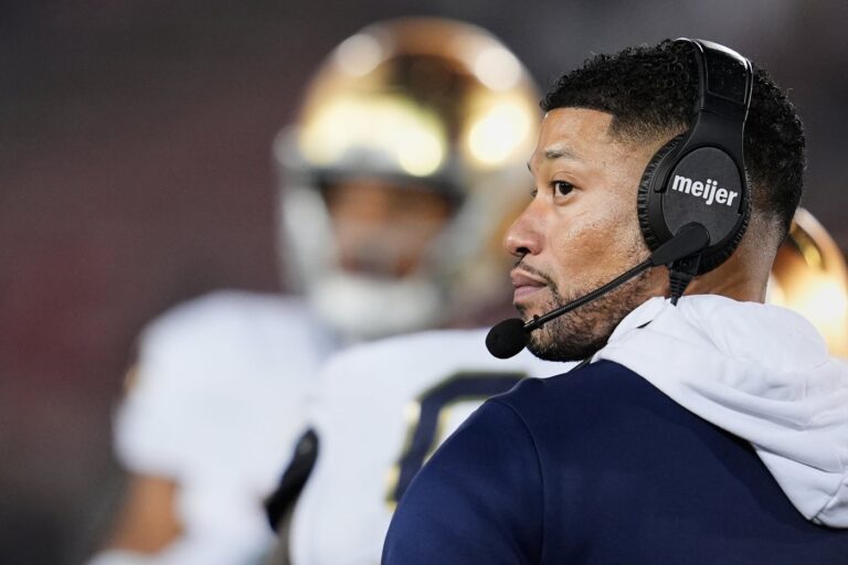 Notre Dame coach Marcus Freeman attends title game, says Irish have to ...