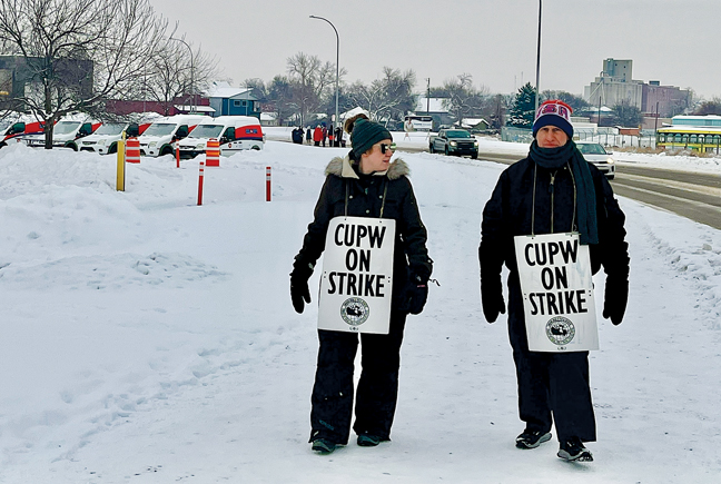 Local postal workers back on strike as sweeping changes announced ...